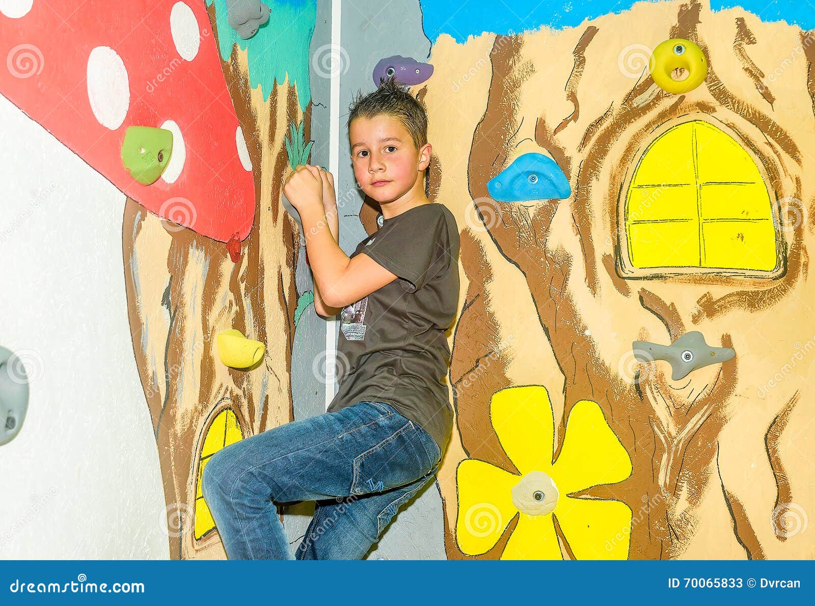 Little Boy Climbing a Rock Wall Indoor Stock Image - Image of amusement ...