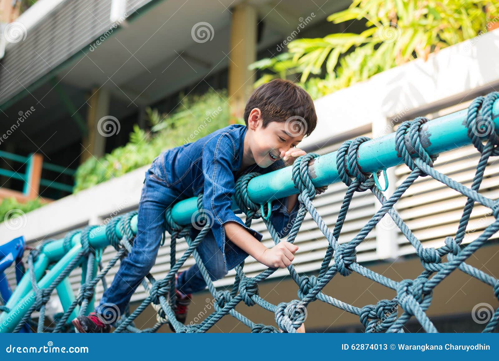 Little Boy Climbing on the Rope at Playground Outdoor Stock Image ...
