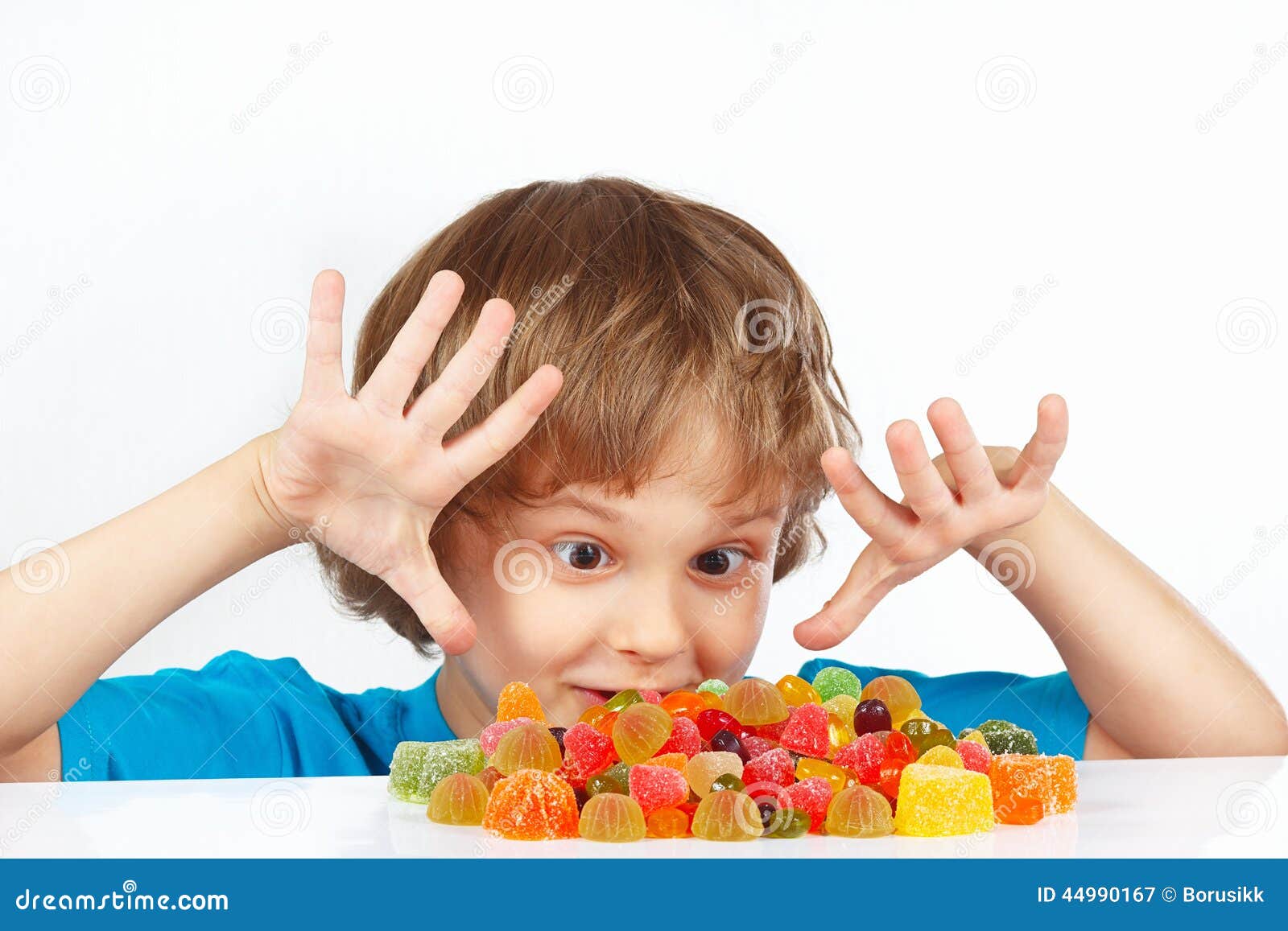 Little Boy with Colored Jelly Candies on White Background Stock Image ...