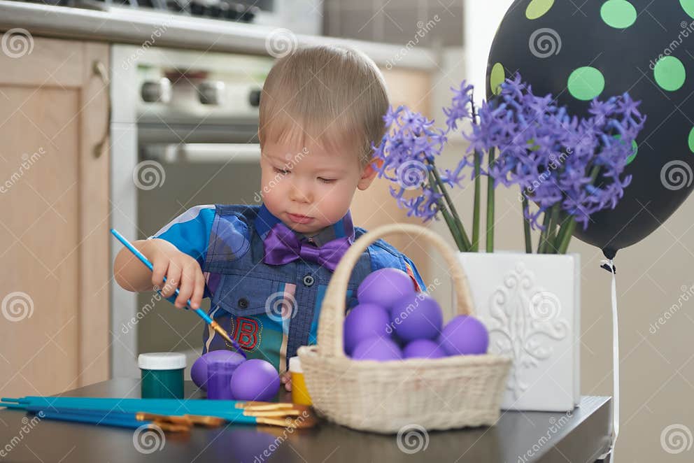 Little Boy Coloring Easter Eggs Stock Photo - Image of kids, table ...