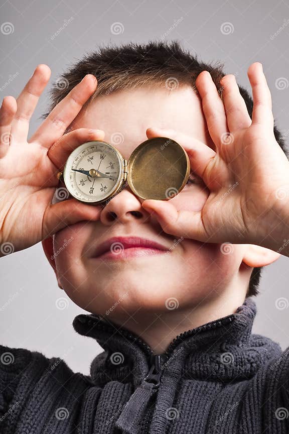 Little boy with compass stock photo. Image of enjoyment - 8486404