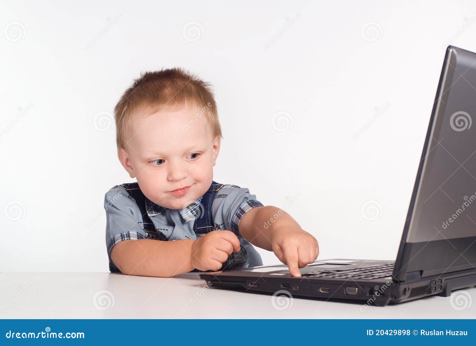 Little boy and computer stock photo. Image of play, people - 20429898
