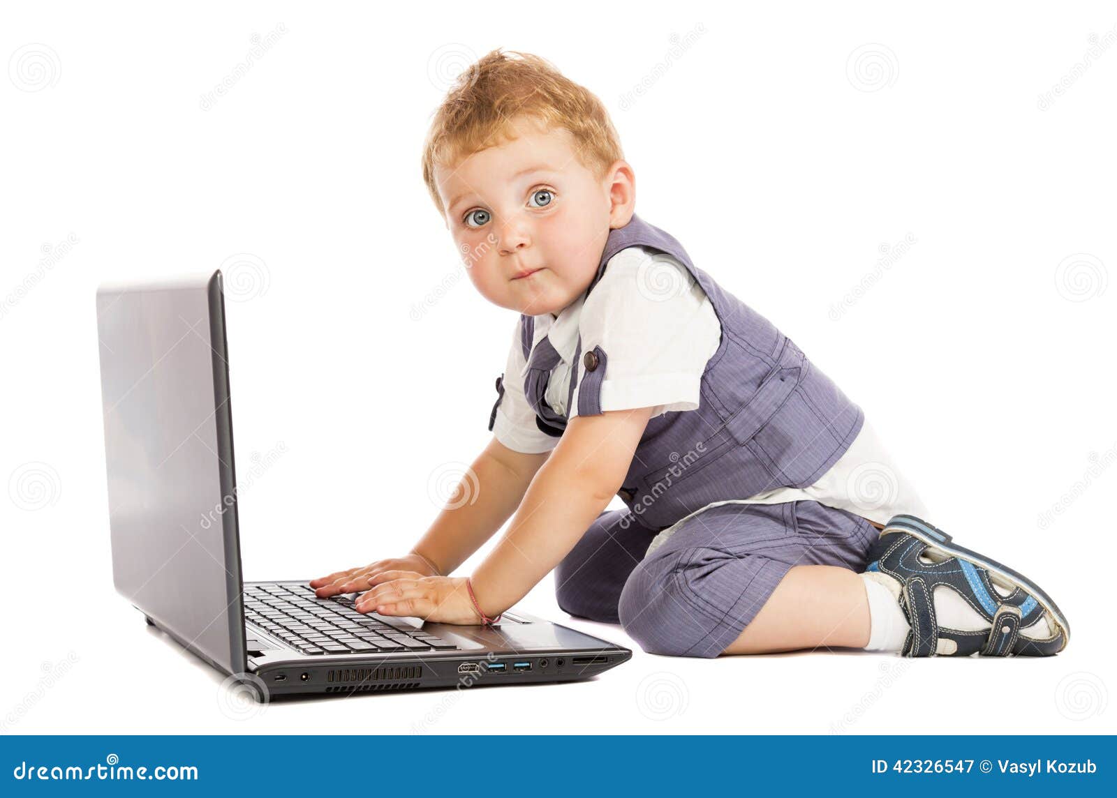 Little boy at the computer stock image. Image of development - 42326547
