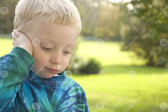 A Little Boy with a Confused Expression Stock Photo - Image of child ...