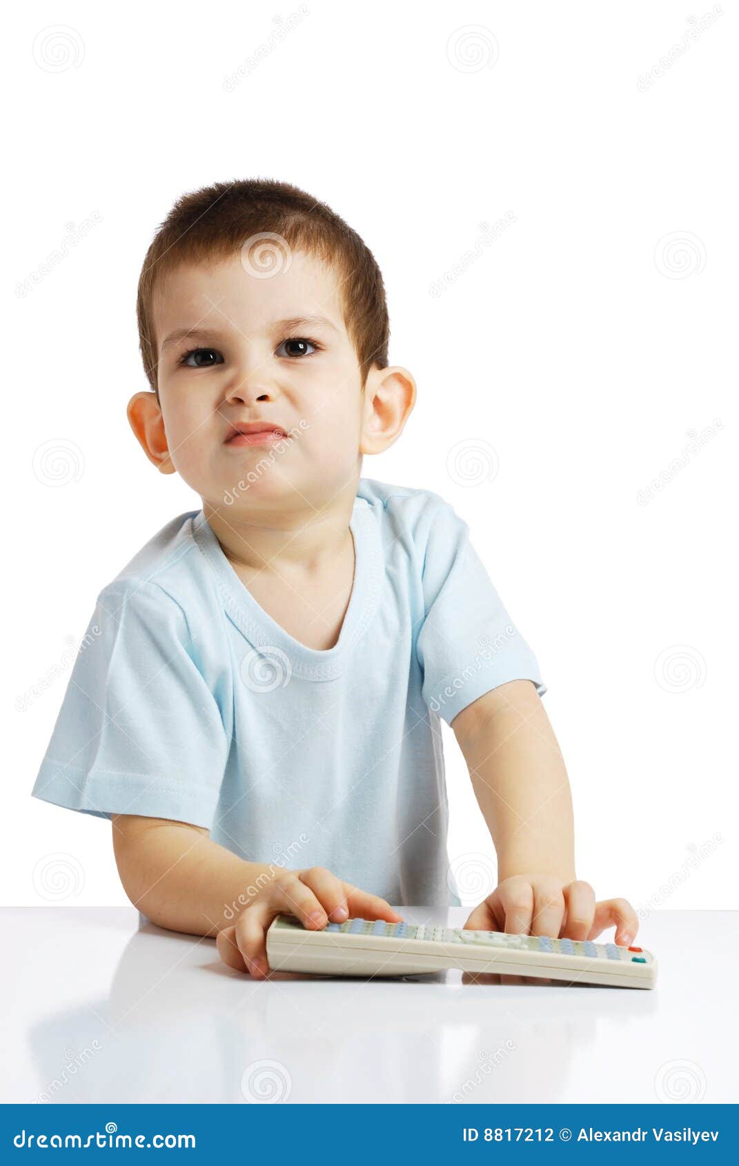 The Little Boy with the Control Panel from the TV Stock Photo - Image ...