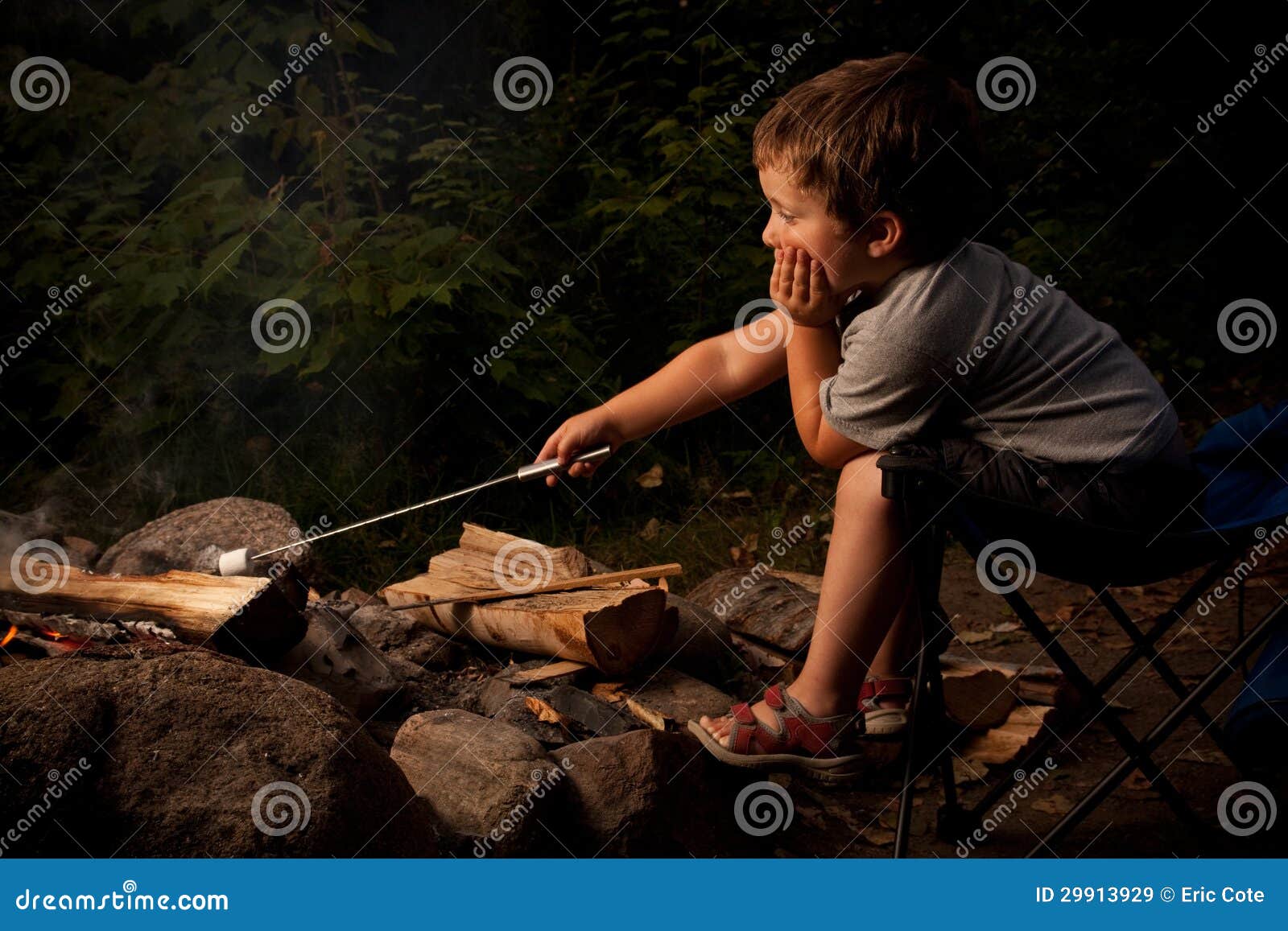 Boy cooking marshmallow stock image. Image of little - 29913929