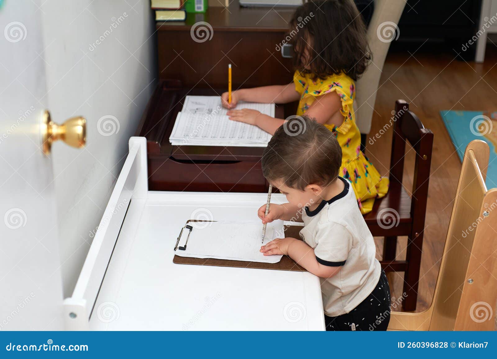 Little Boy Copying His Sister Doing Her Homework Stock Photo - Image of ... Little Boy Copying His Sister Doing Her Homework Stock Photo - Image of ...