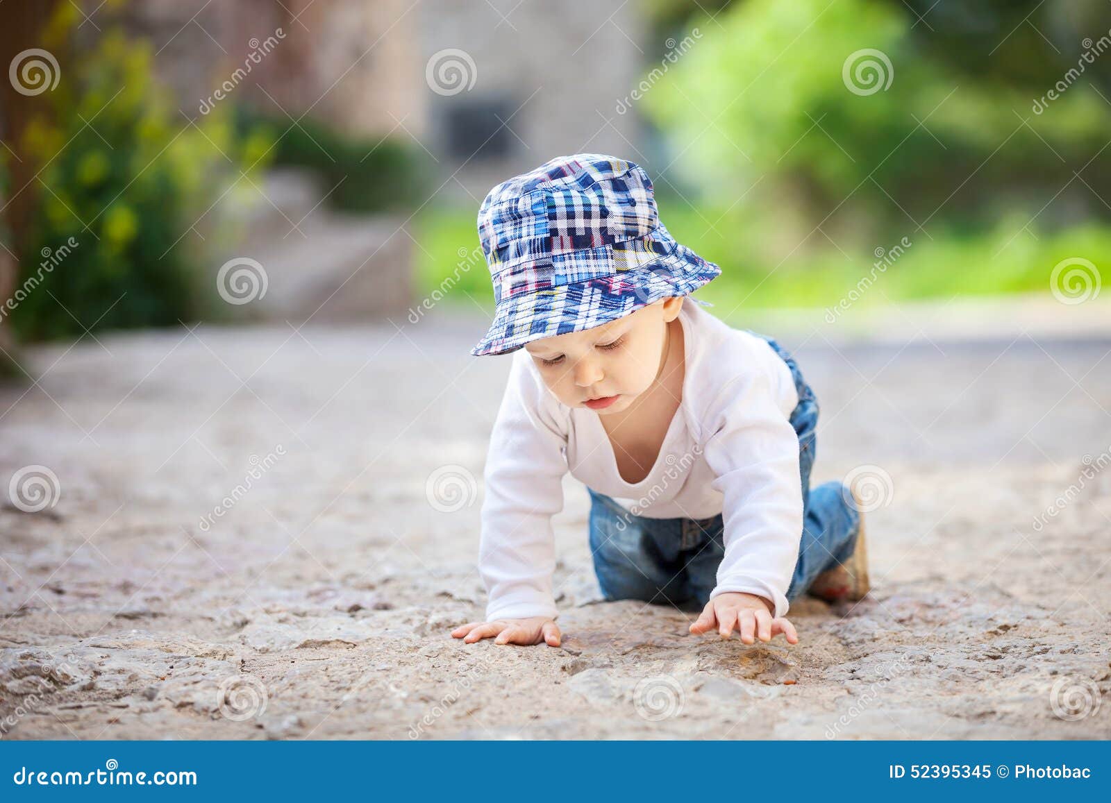 Little Boy Crawling on Stone Paved Sidewalk Stock Image - Image of ...