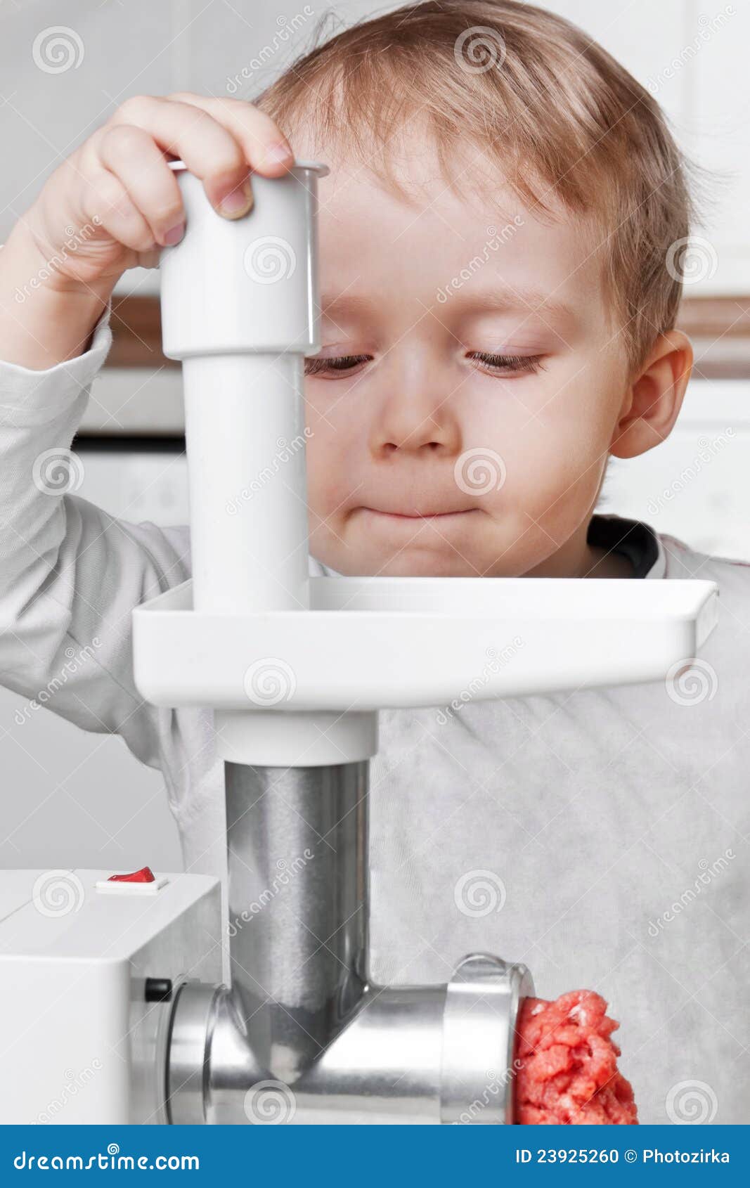 Little boy cutting meat stock photo. Image of flour, cute - 23925260
