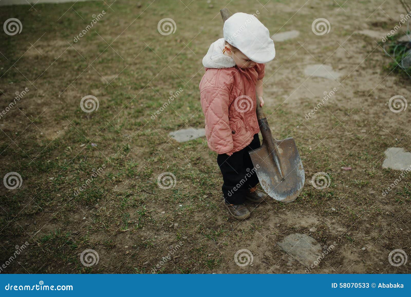 Little boy digging a hole stock image. Image of grow - 58070533