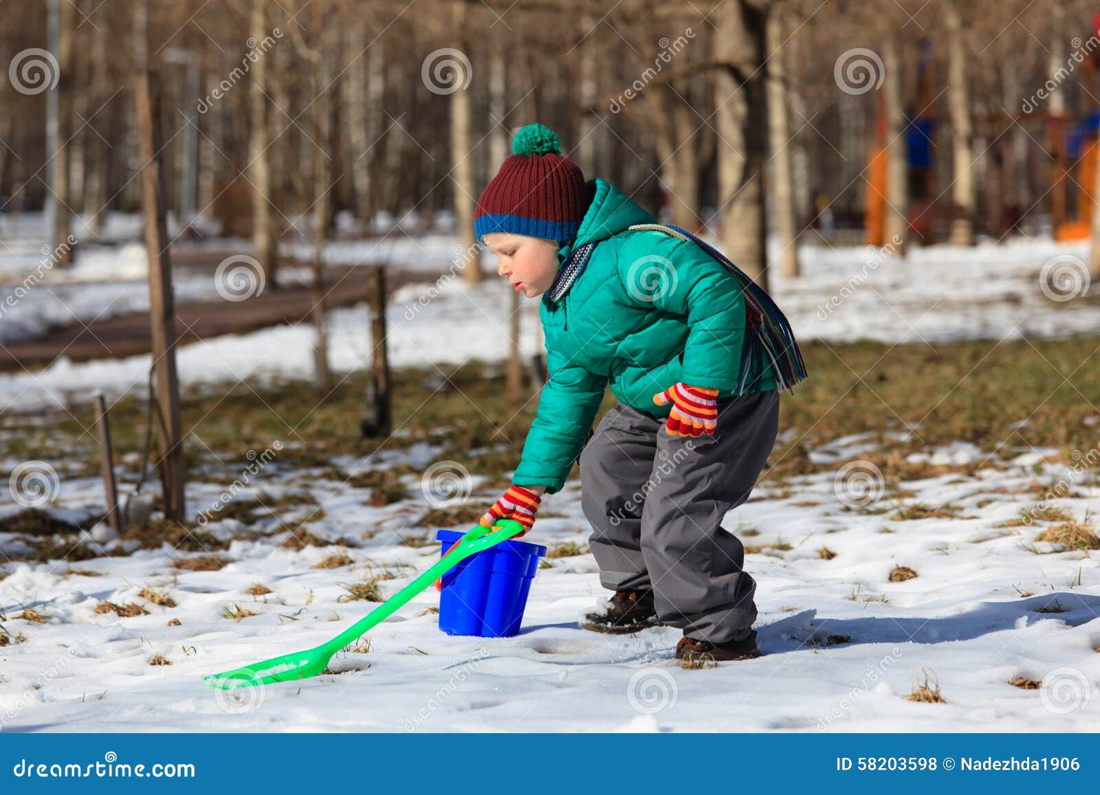 Little Boy Digging in Winter Park Stock Photo - Image of childhood ...