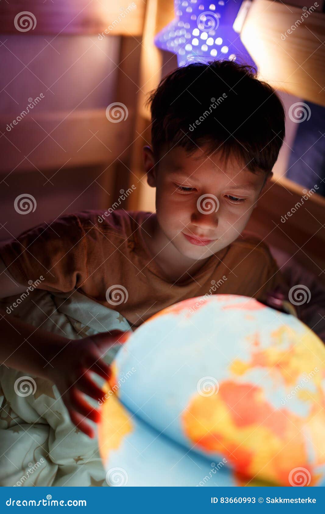 Little Boy Discovering Countries on Globe at Night Stock Image - Image ...