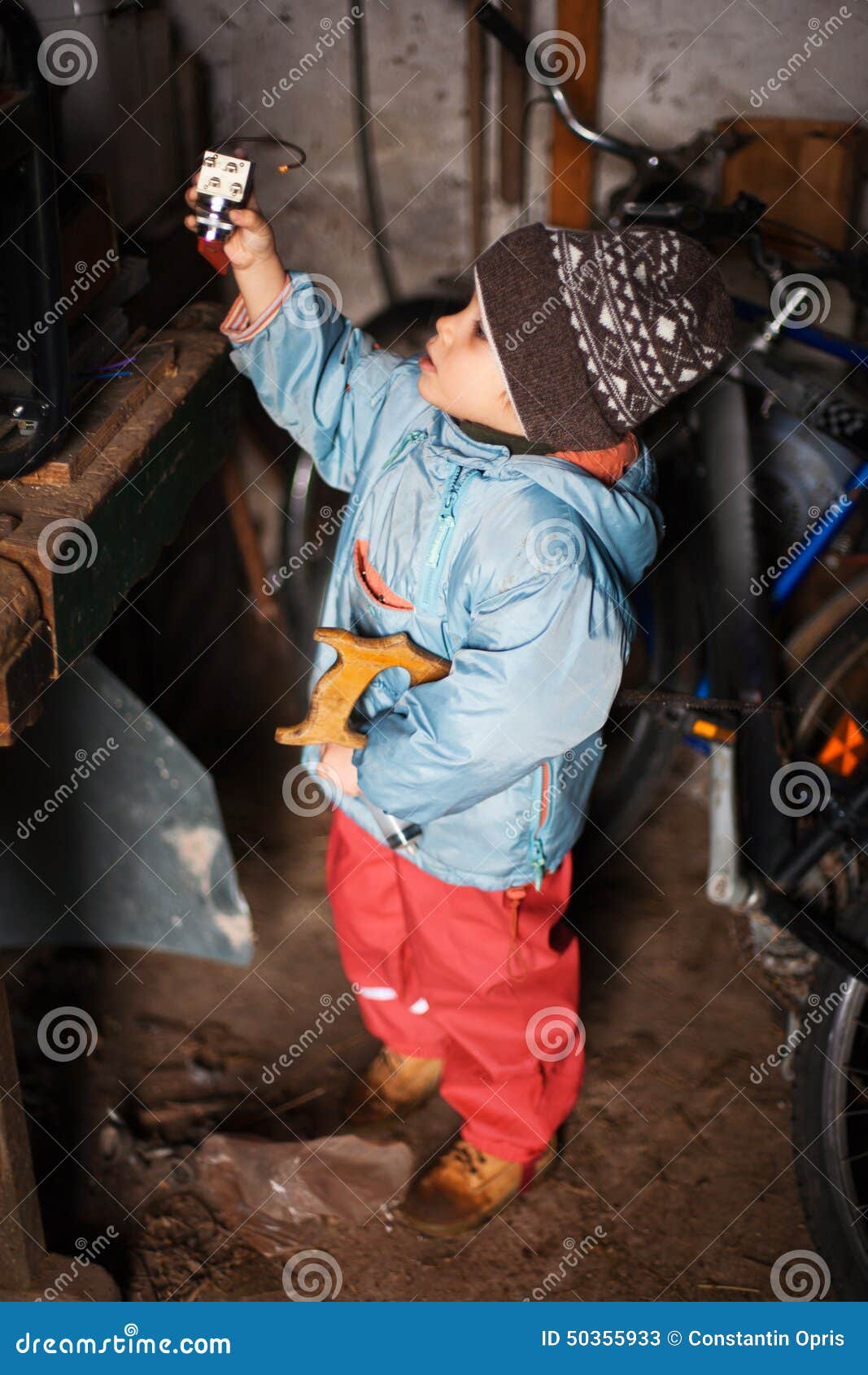 Little Boy Discovering Tools Stock Image - Image of little, attentive ...