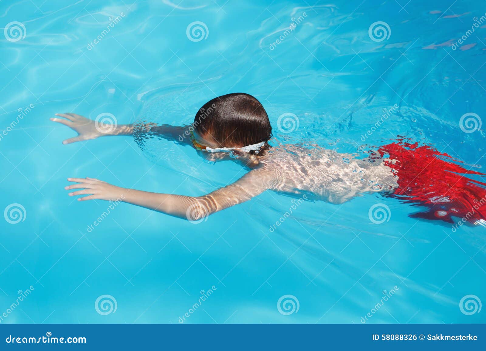 Little boy diving in pool stock photo. Image of sport - 58088326