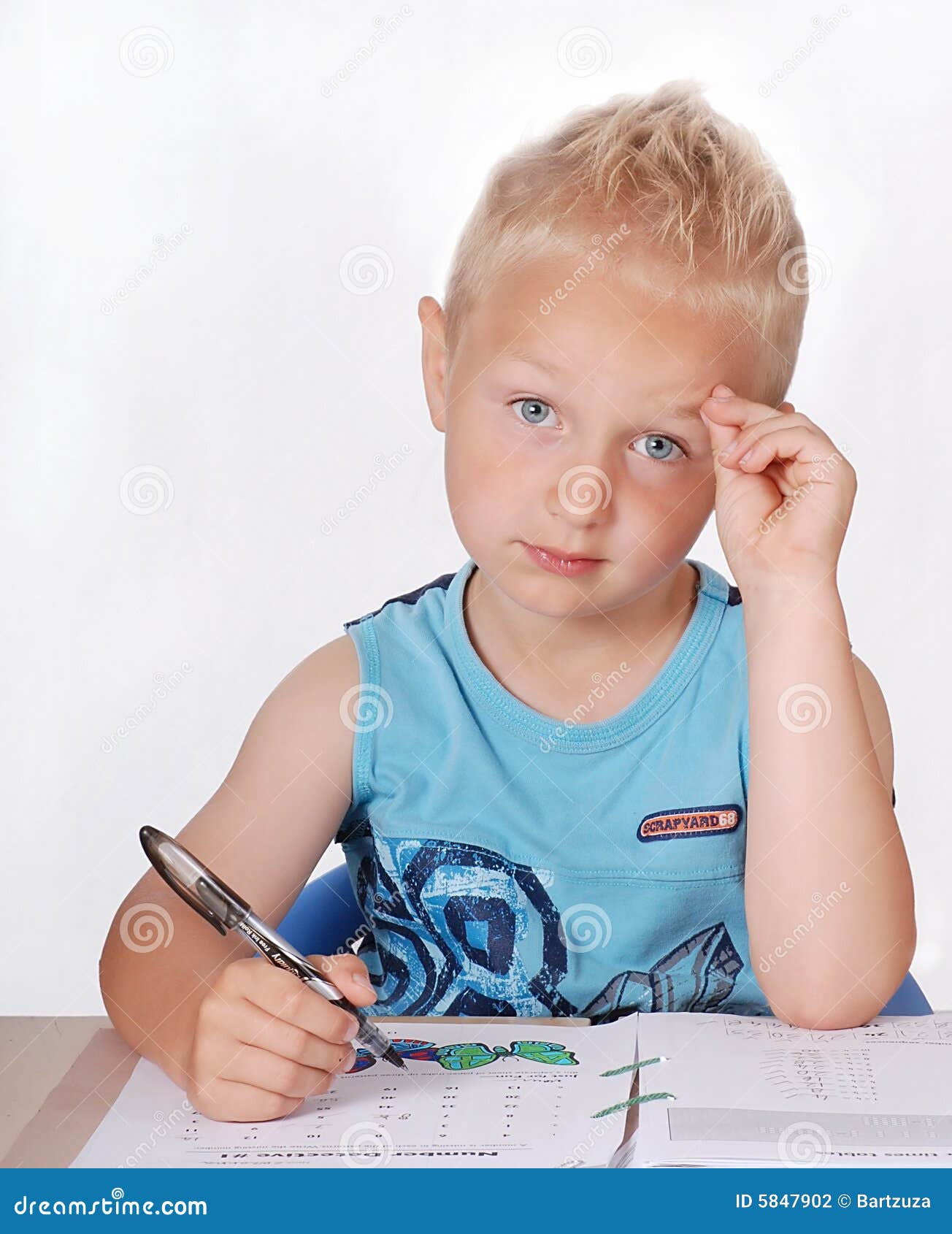 Little boy doing homework stock photo. Image of smiling - 5847902