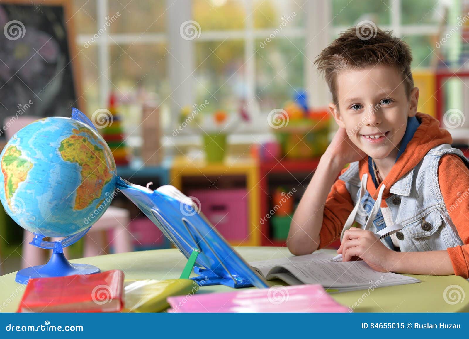 Little boy doing homework stock image. Image of little - 84655015