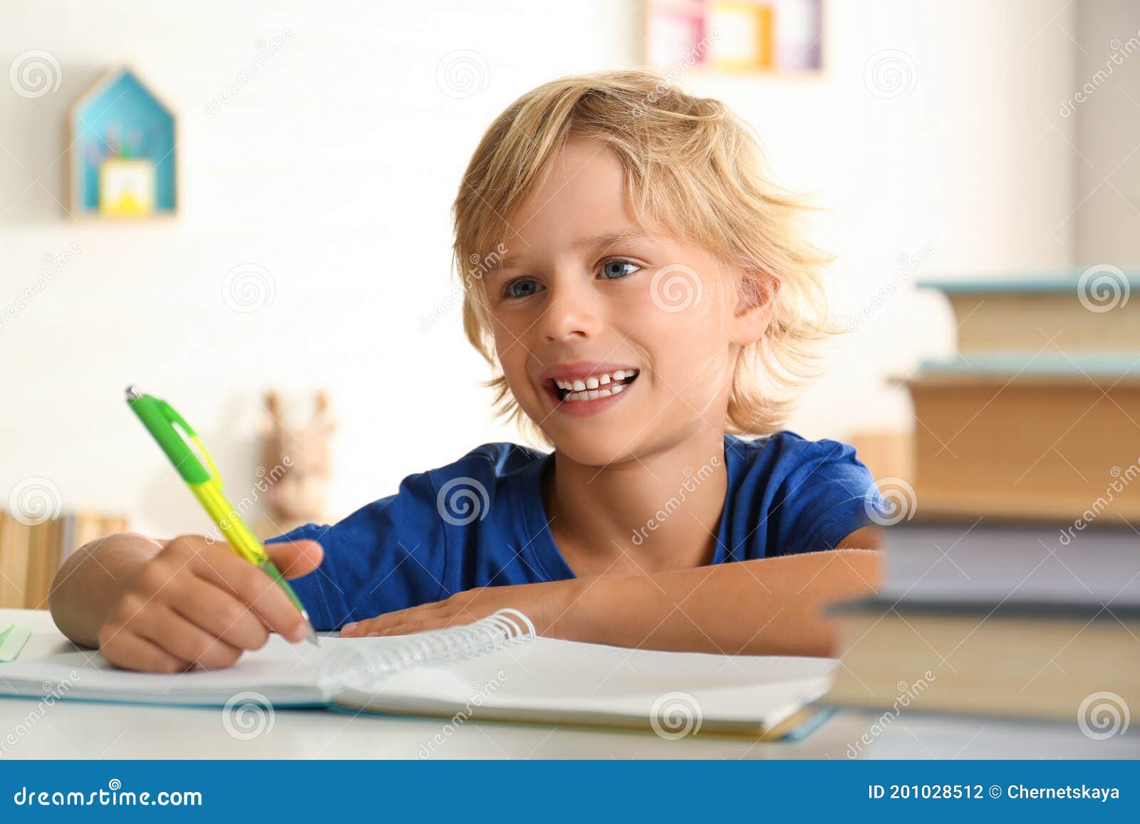 Little Boy Doing Homework at Table Indoors Stock Photo - Image of ...