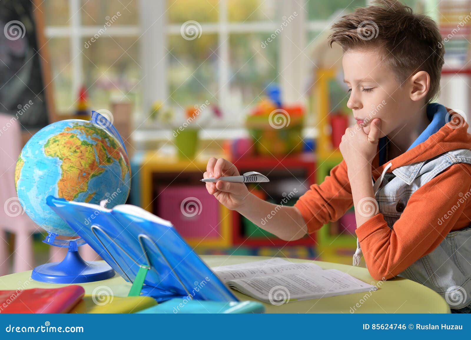Little boy doing lessons stock photo. Image of person - 85624746