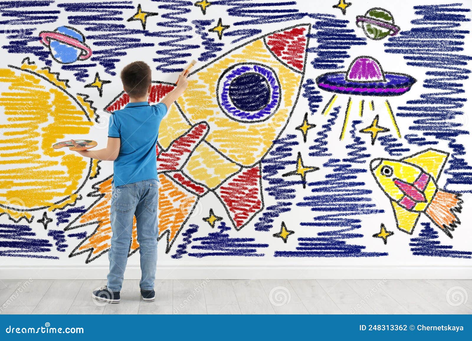 Little Boy Drawing His Dreams on Wall, Back View Stock Photo - Image of ...