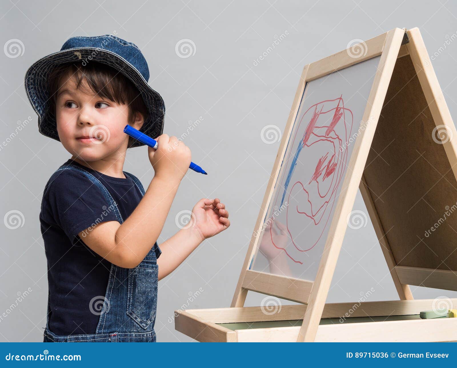 Little Boy Draws Chalk on a School Board Stock Photo - Image of school ...