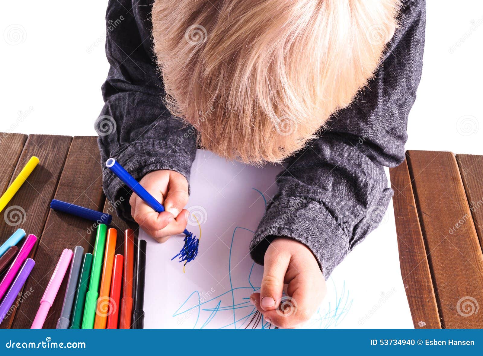 Little boy draws a drawing stock photo. Image of creation - 53734940