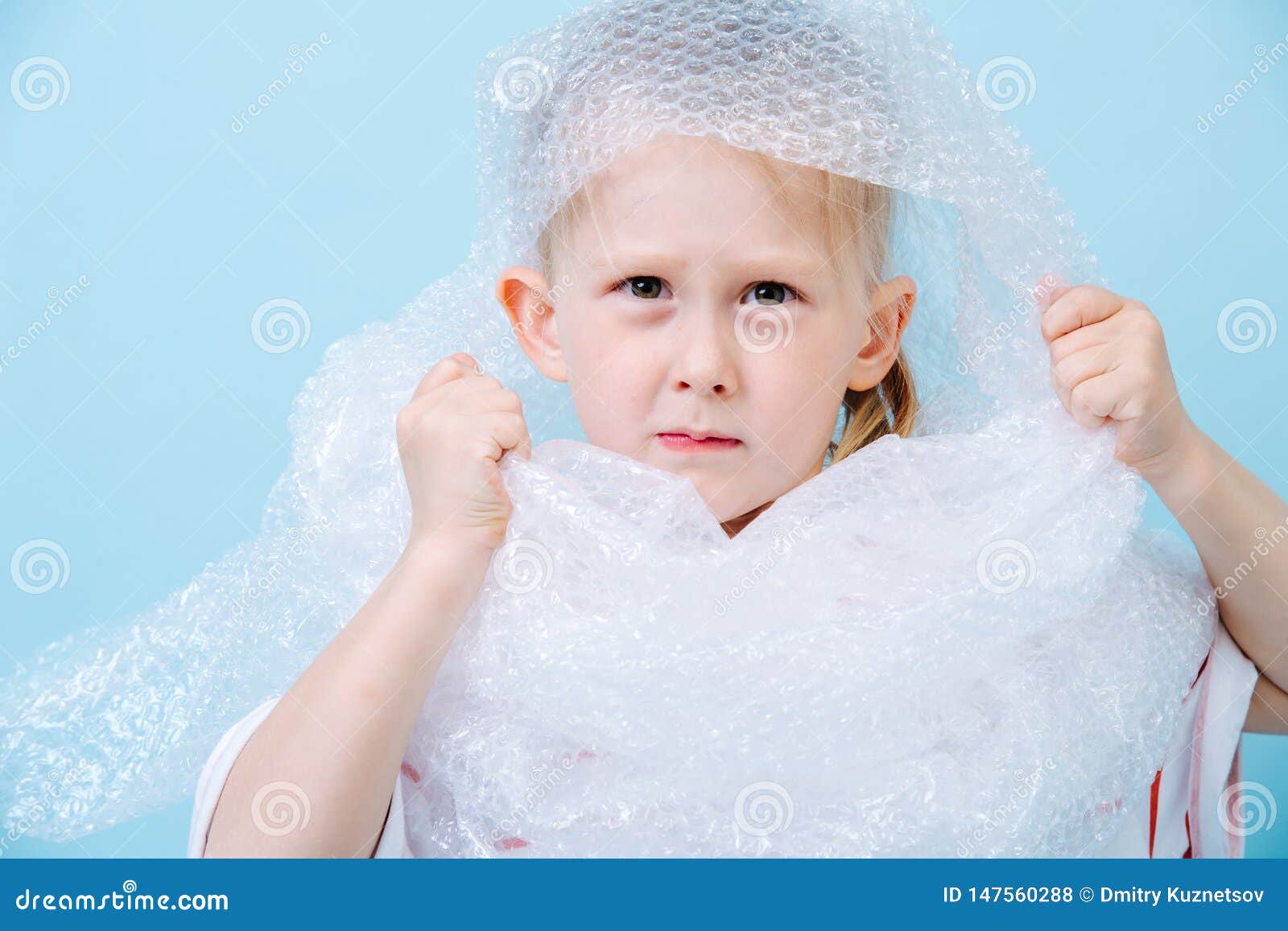 Little Boy is Dressed in Bubbled Wrap in Protest of Waste Crisis Stock ...