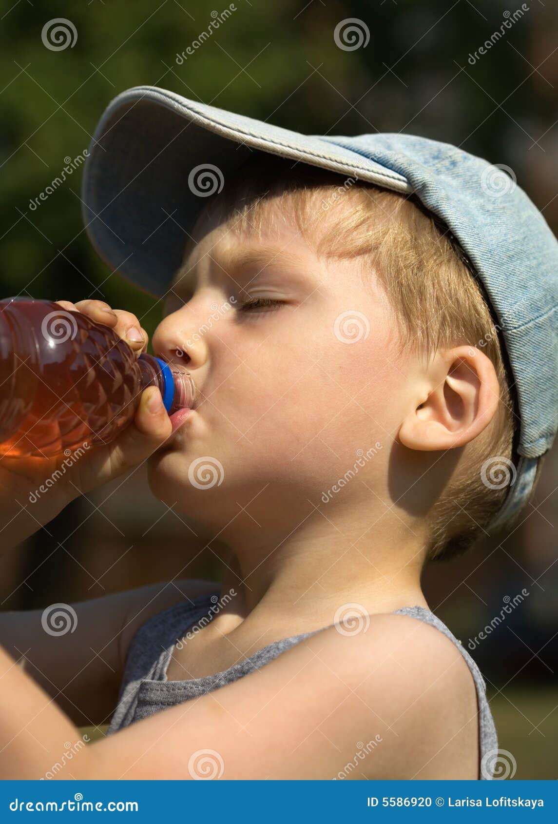 Little boy is drinking stock photo. Image of liquid, hand - 5586920