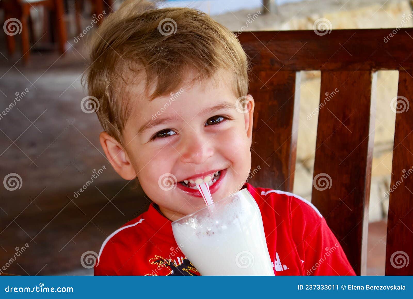 Little Boy Drinking Milkshake through a Straw Stock Image - Image of ...
