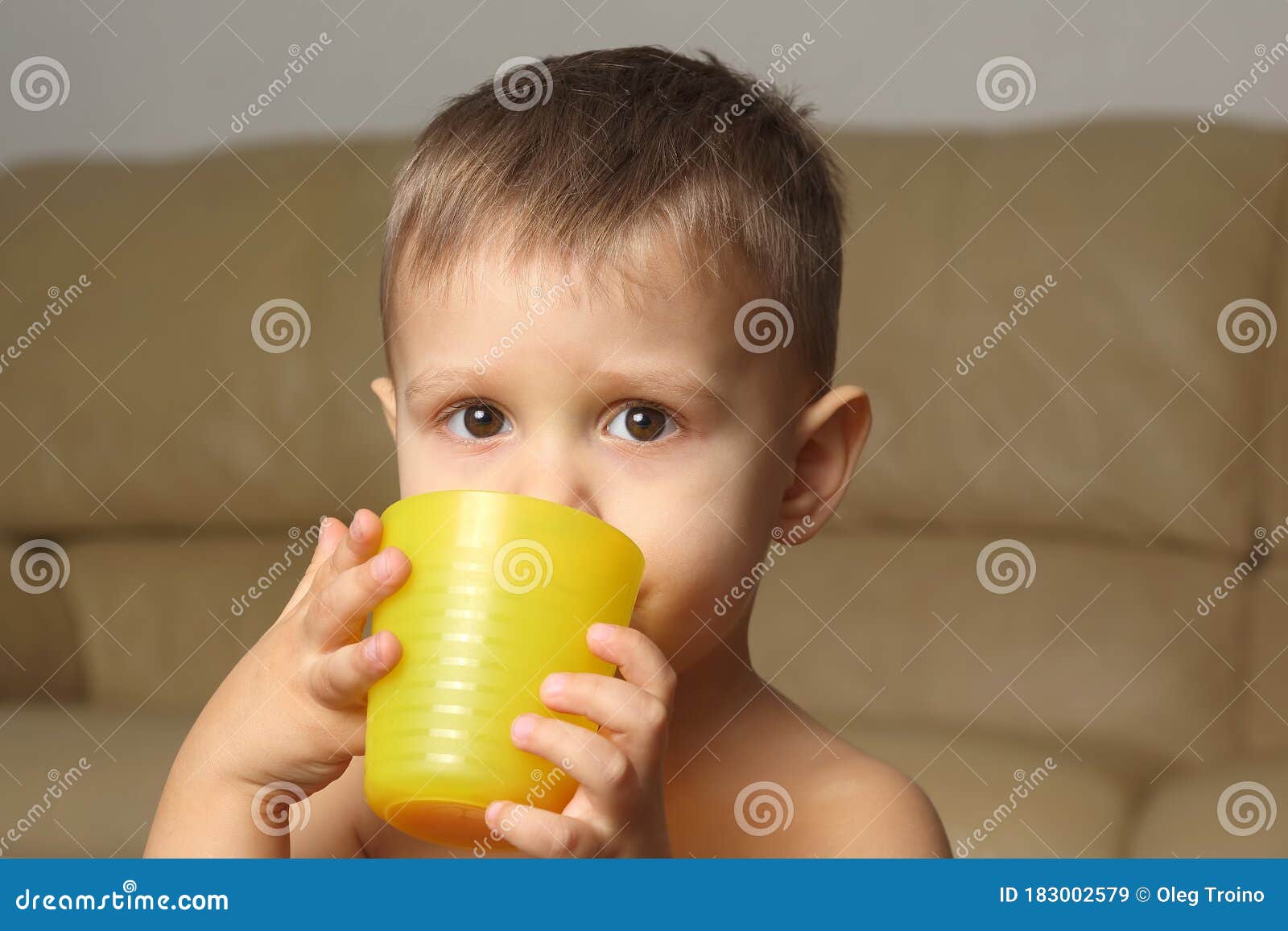 Little Boy Drinking from a Plastic Cup Stock Image - Image of liquid ...
