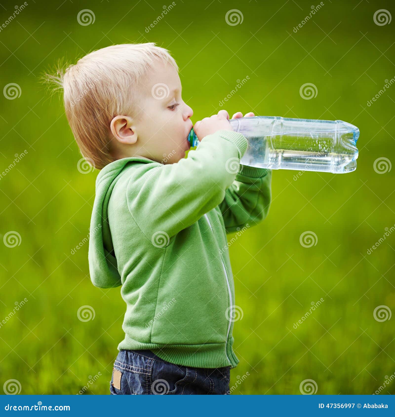 Little Boy Drinks Mineral Water Stock Image - Image of head, bottle ...