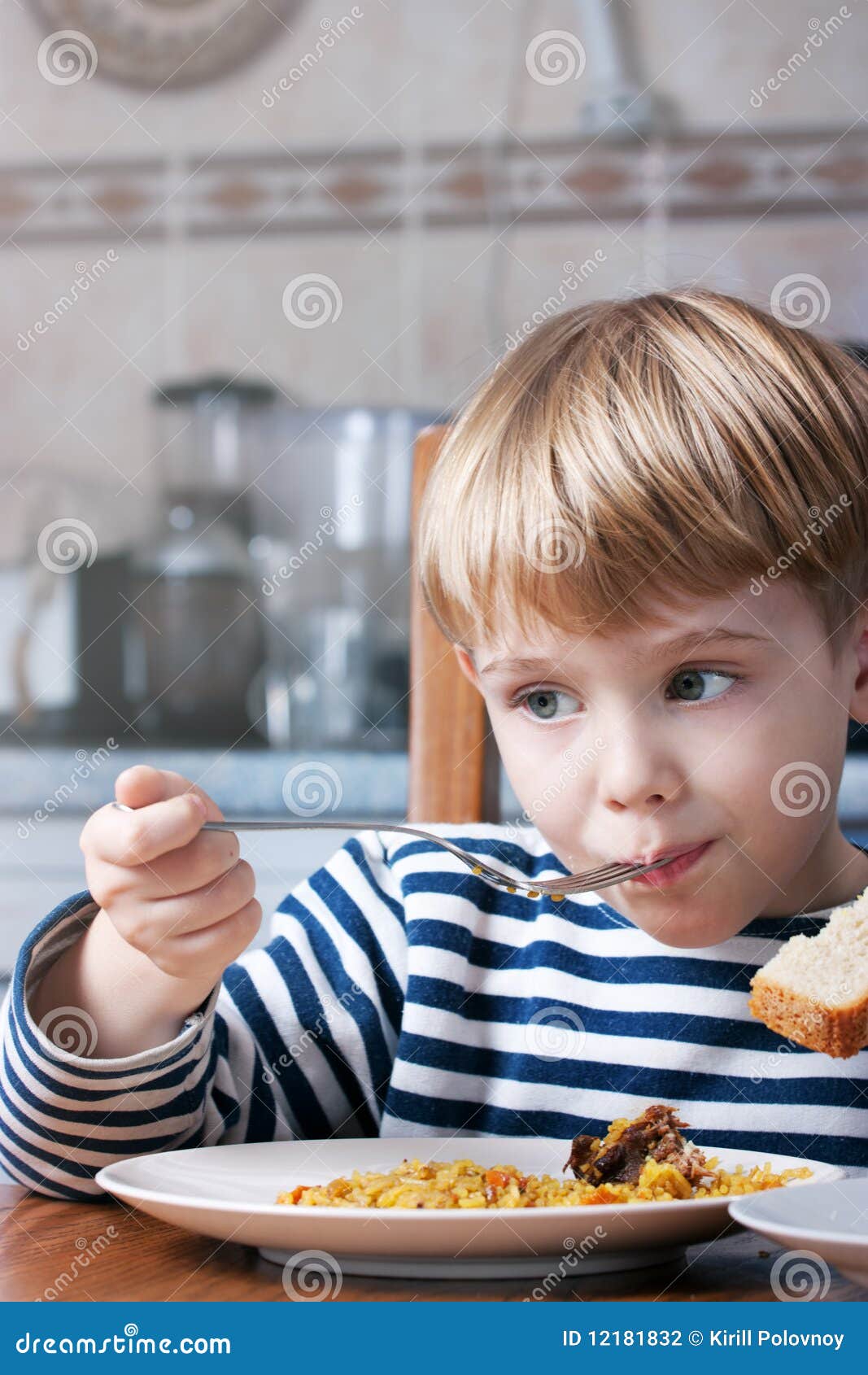Little boy eating stock photo. Image of hand, happy, male - 12181832