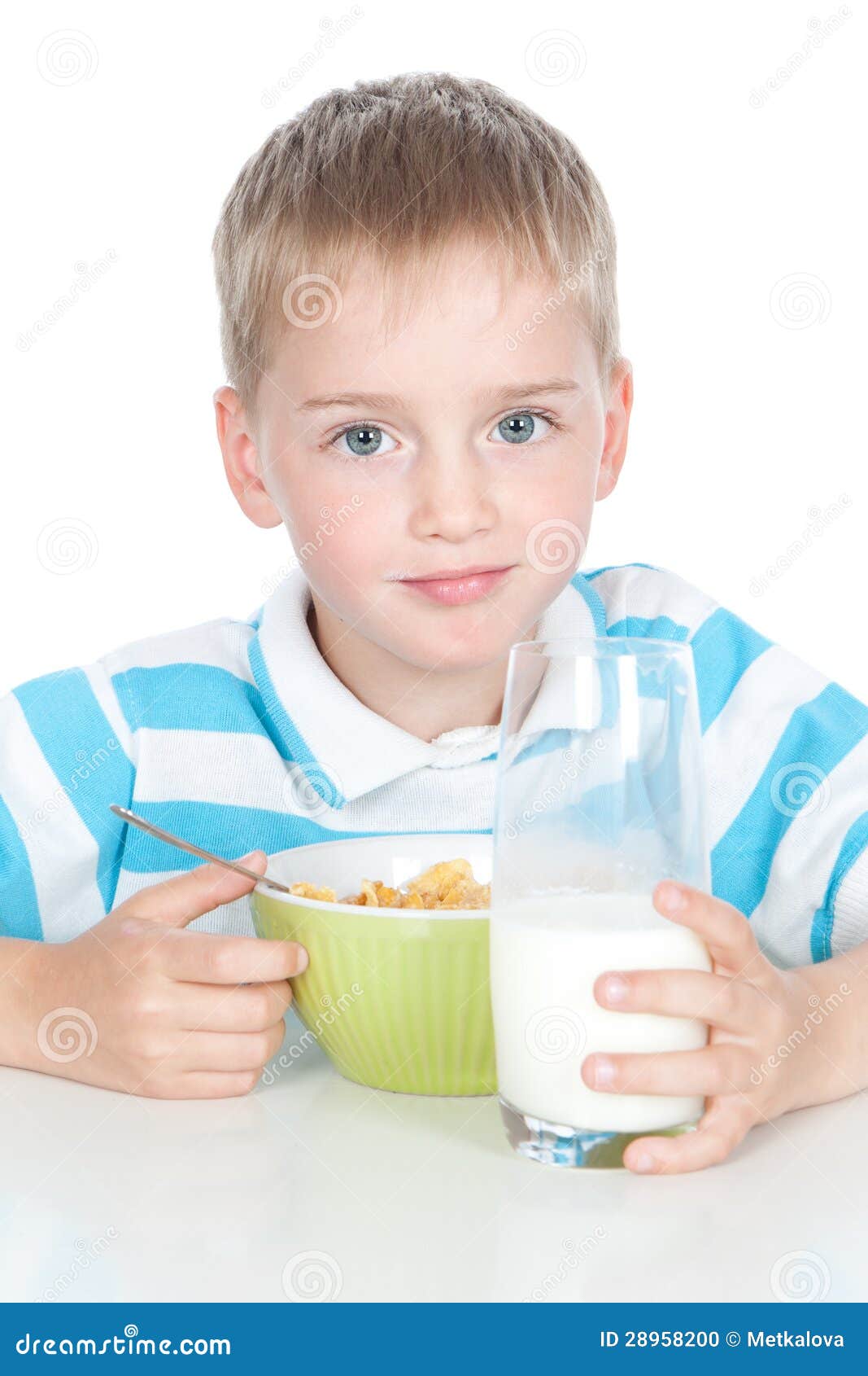 Little Boy Eating Breakfast at the Table Stock Photo - Image of happy ...