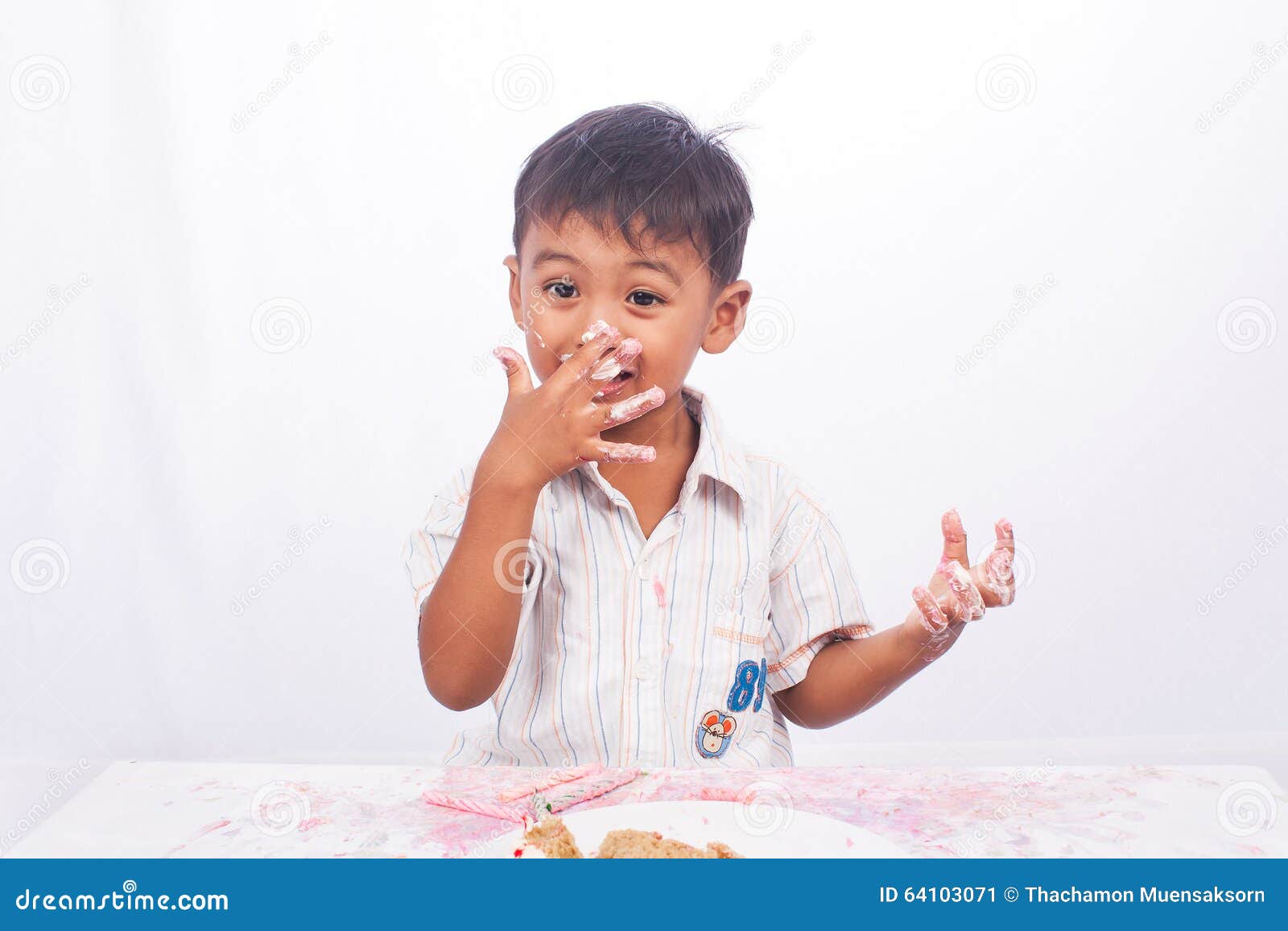 Little boy eating cake stock image. Image of dessert - 64103071