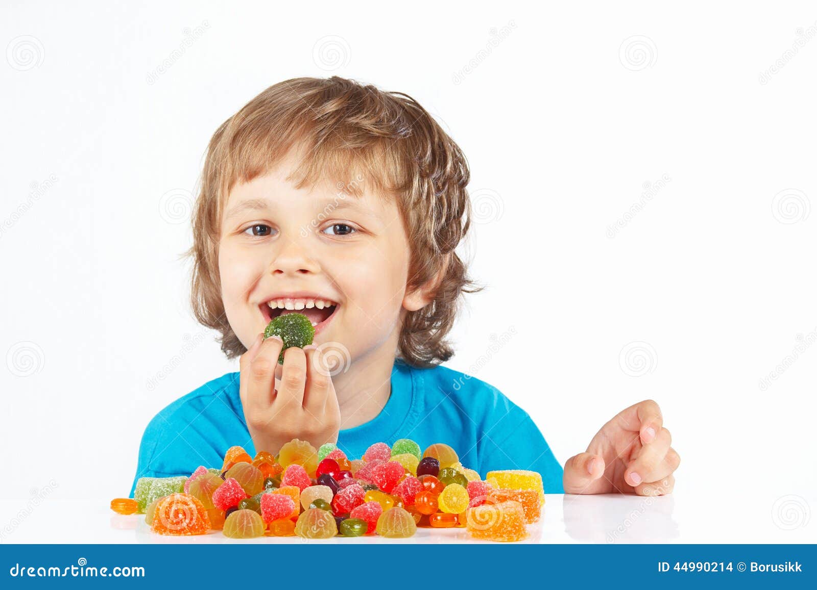 Little Boy Eating Candies on White Background Stock Photo - Image of ...