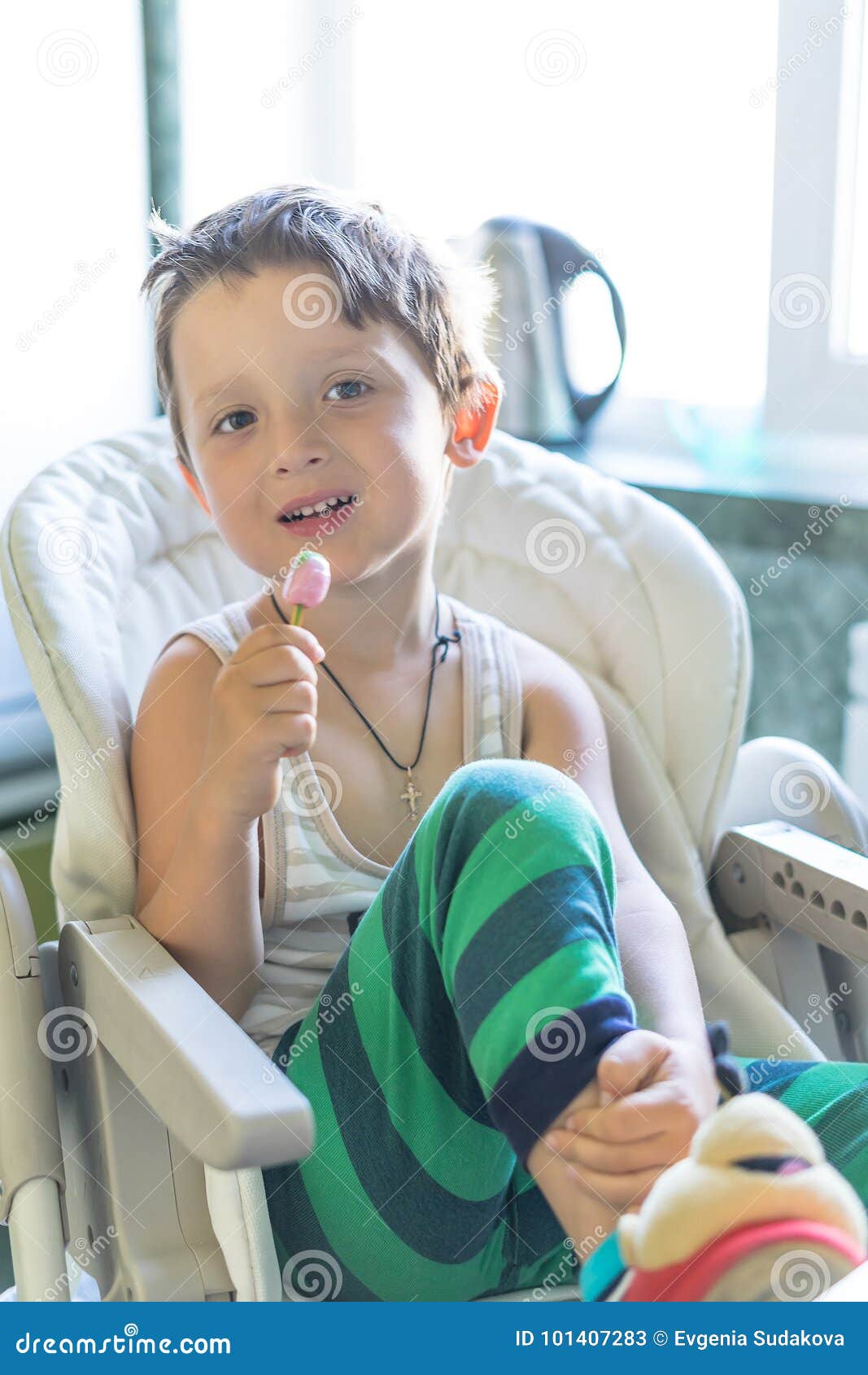 Little Boy Eating Candy in the Kitchen. Stock Image - Image of child ...