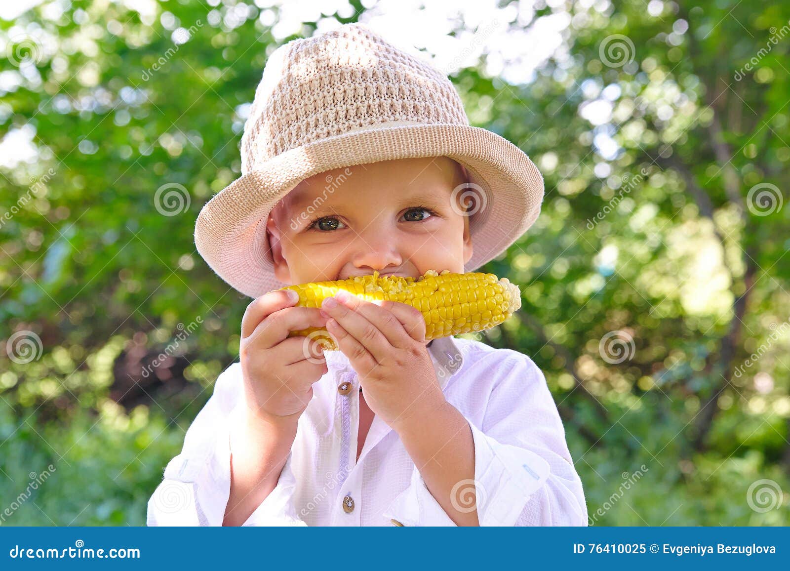 Little Boy Eating a Cob of Boiled Corn Stock Image - Image of vacation ...