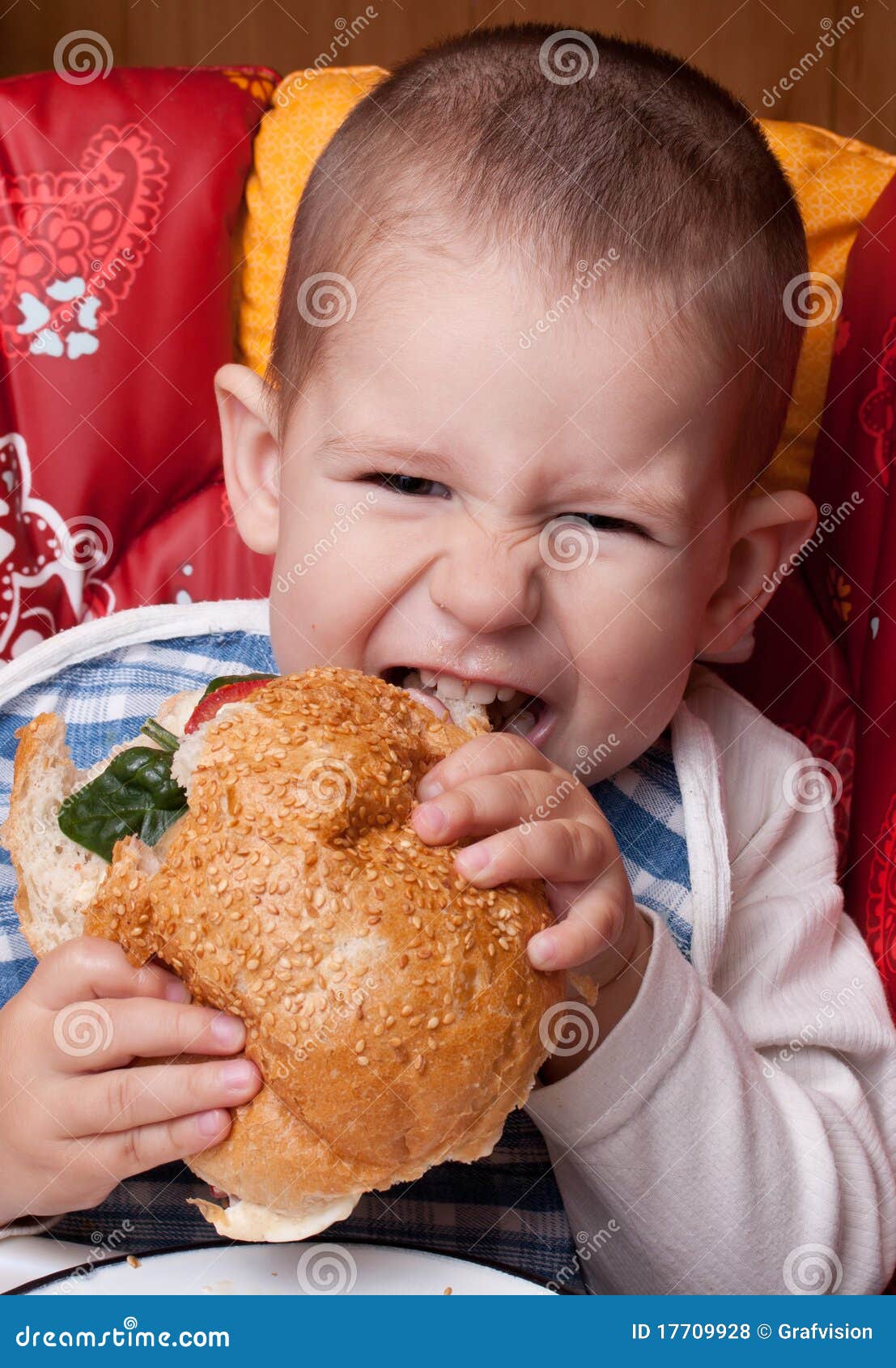 Little Boy Eating Hamburger Stock Photo - Image of dinner, beef: 17709928