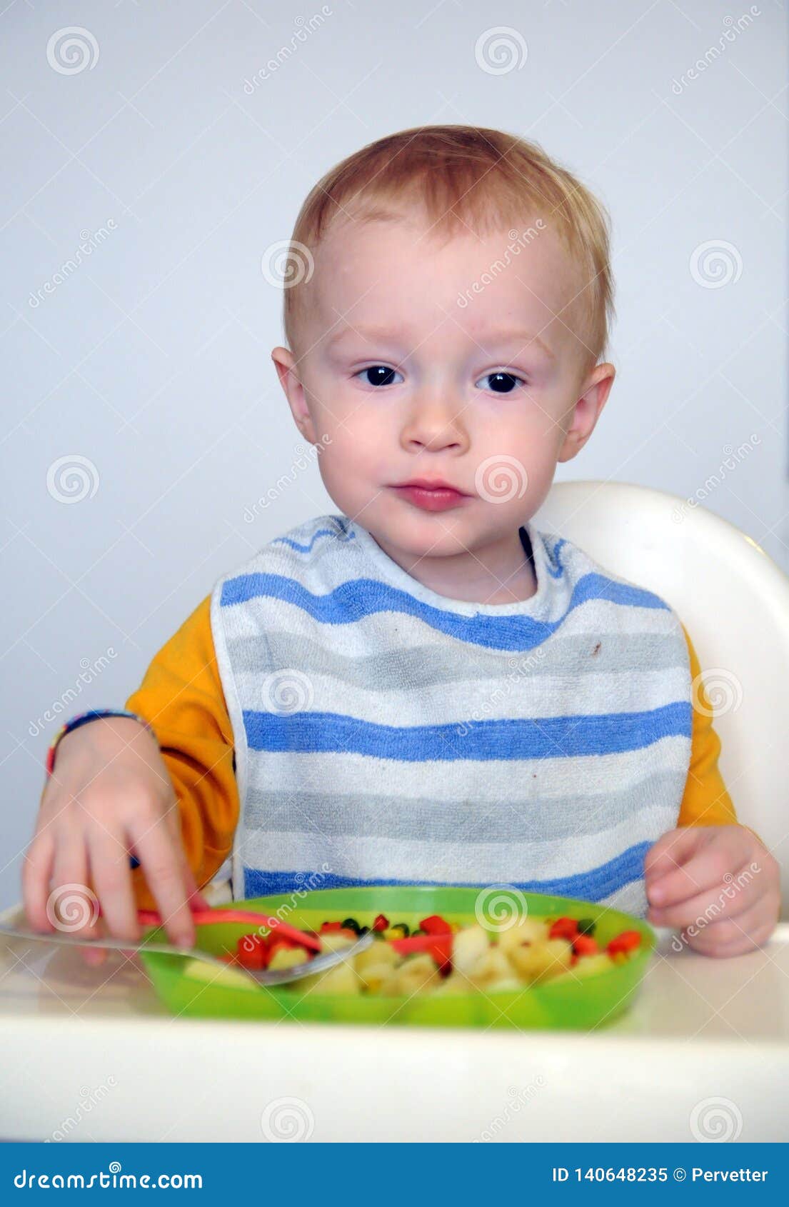 The Little Boy is Eating His Food Stock Image - Image of lunch, plate ...