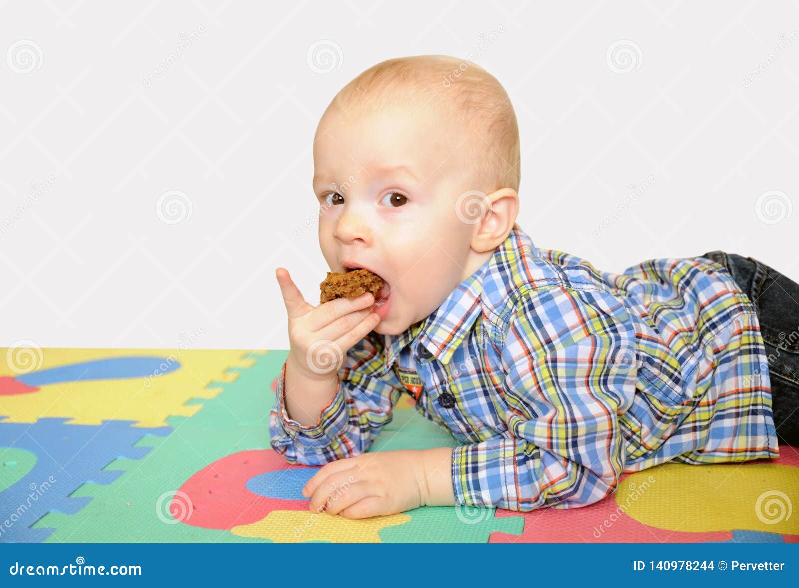 The Little Boy is Eating His Food Stock Photo - Image of adorable, face ...