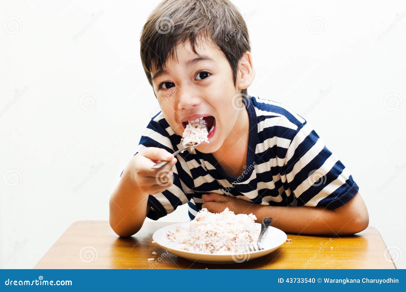 Little Boy Eating Rice Happy Face Stock Photo - Image of happy, spoon ...
