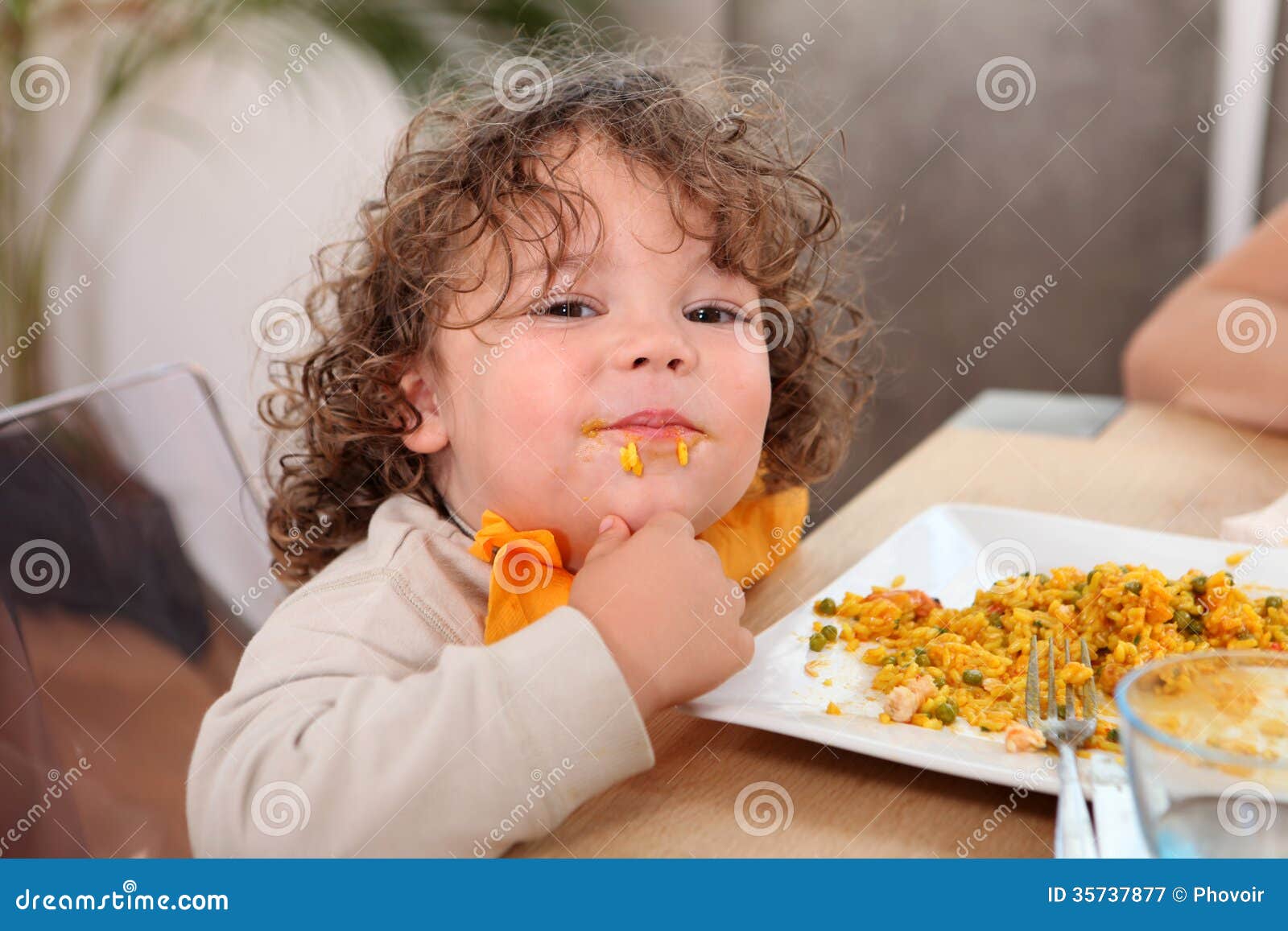 Little boy eating rice= stock image. Image of messy, cute - 35737877