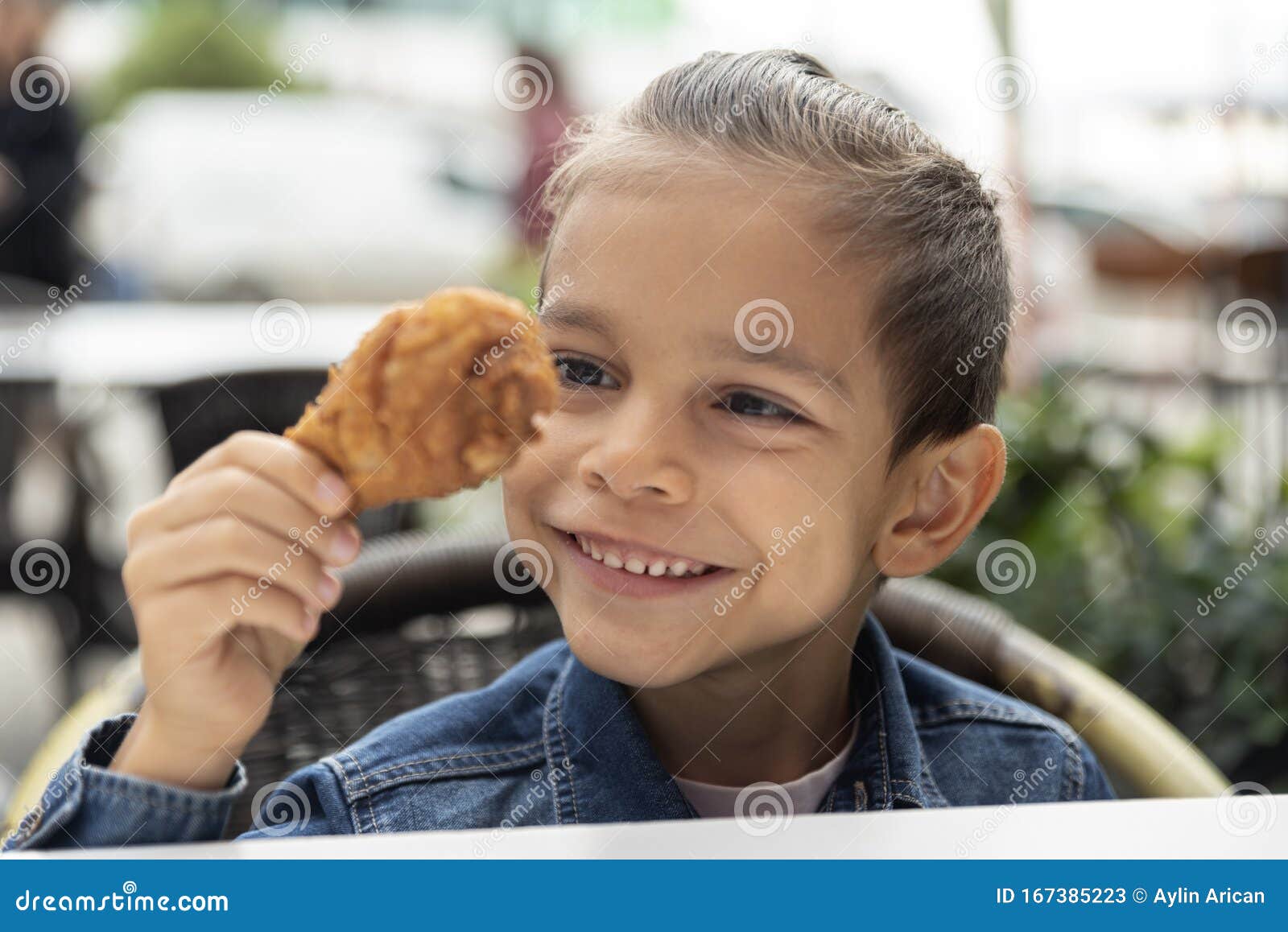 Little Boy Eats Fried Chicken Stock Image - Image of hungry, bite ...
