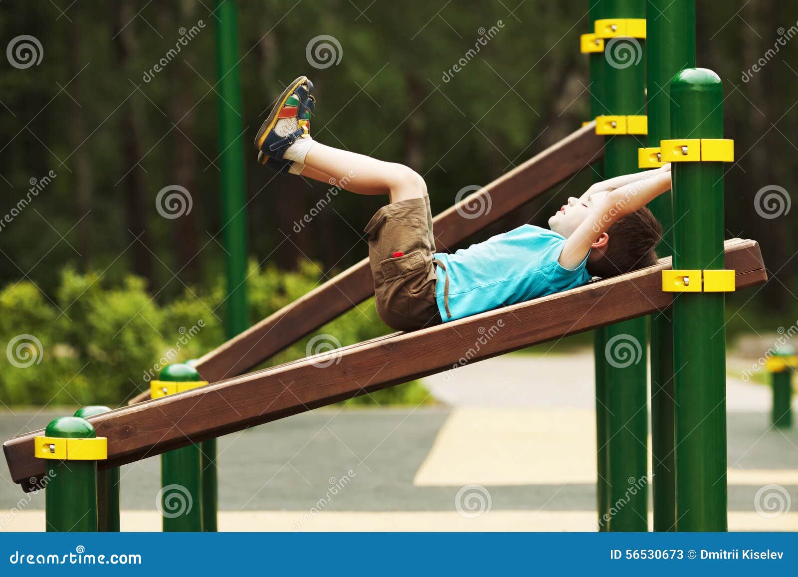 Little Boy Exercise on the Playground Stock Image - Image of physical ...