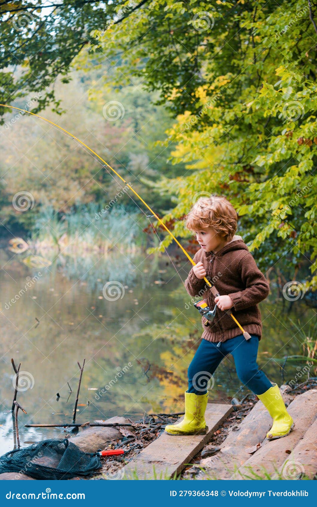Little Boy Fishing. Kid Pulling Rod while Fishing on Weekend. Stock ...
