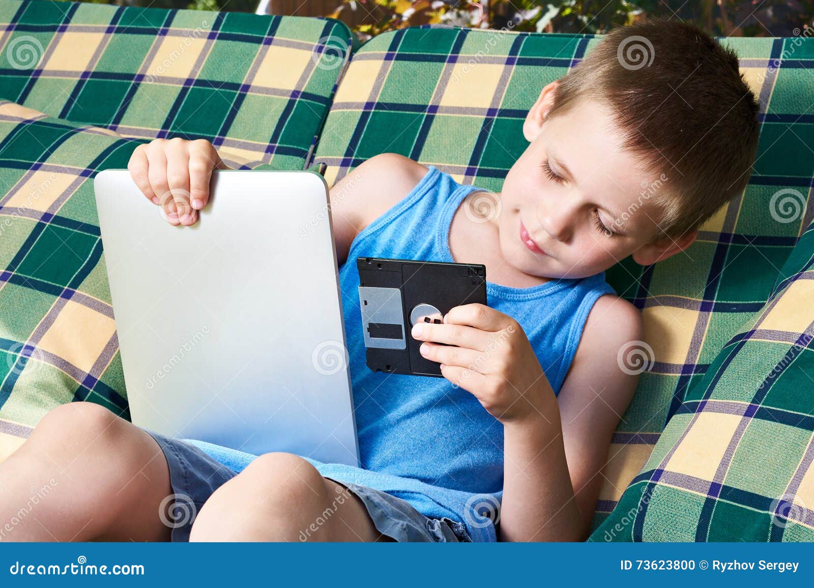 Little Boy with Floppy Disk and Tablet Pc Stock Photo - Image of ...