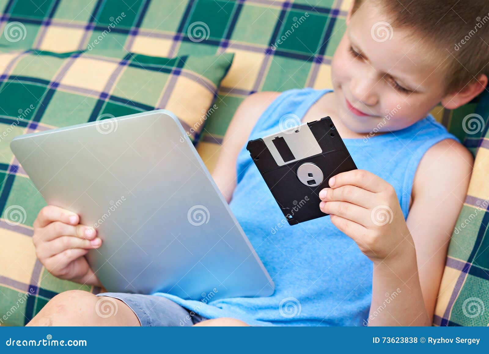 Little Boy with Floppy Disk and Tablet Pc Stock Photo - Image of shirt ...