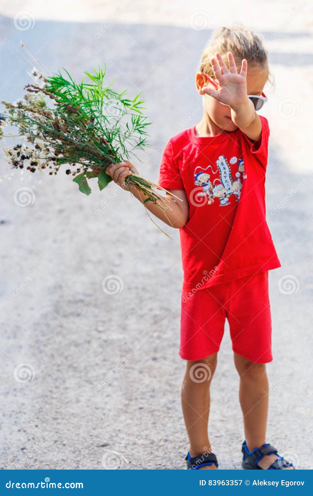 Little boy with flowers stock image. Image of face, little - 83963357