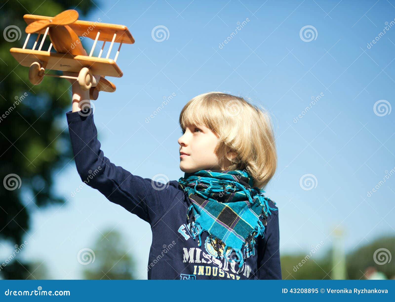 A Little Boy Flying His Airplane Stock Image - Image of years, vehicle ...