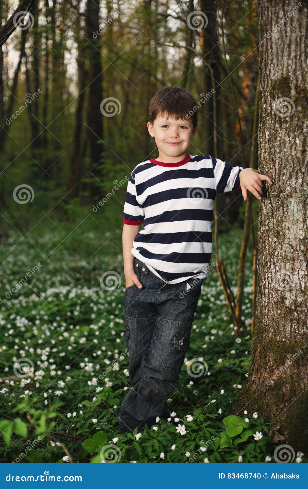 Little Boy in Forest on Flowers Field Stock Photo - Image of happy ...