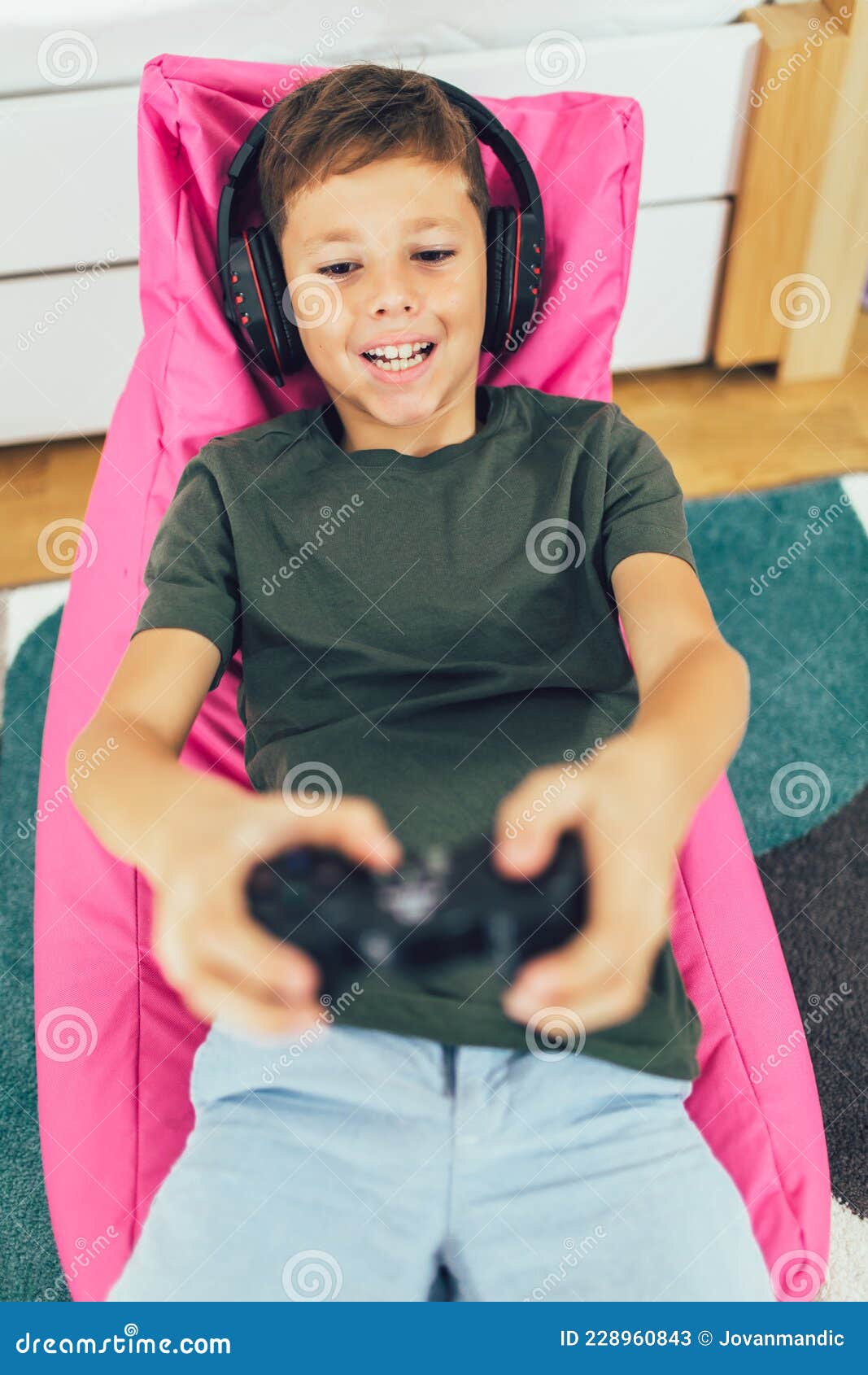 Boy with Gamepad Playing Video Game at Home Stock Image - Image of childhood, entertainment ...